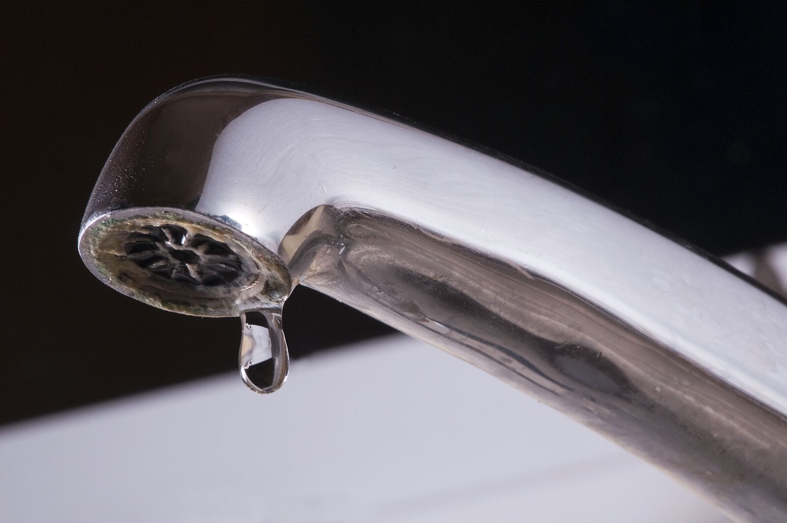 How to Fix a Dripping Faucet I Titan Plumbing And Electric